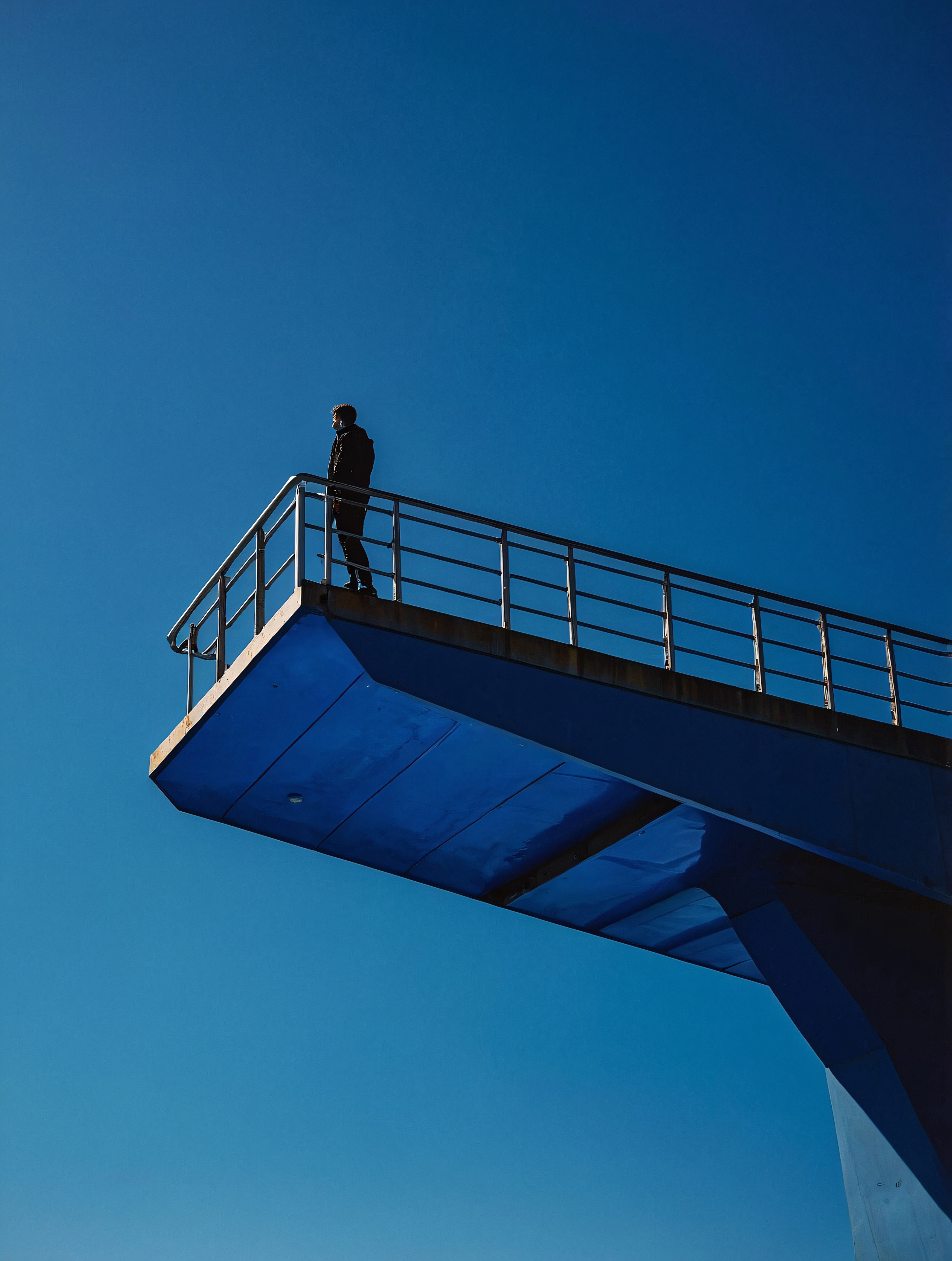 Diver on Blue Platform Photo on Lummi