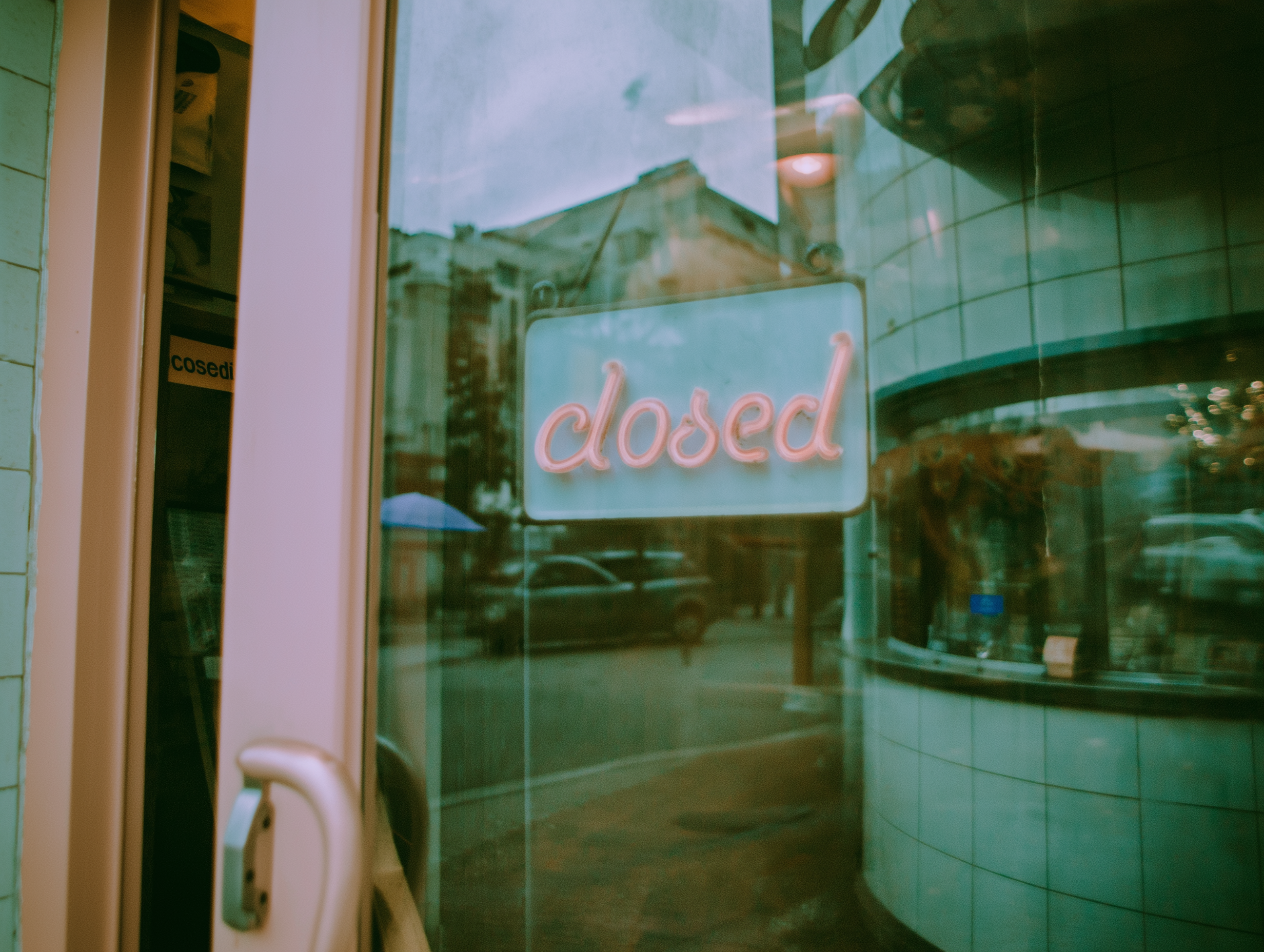 Storefront with Neon Closed Sign Photo on Lummi