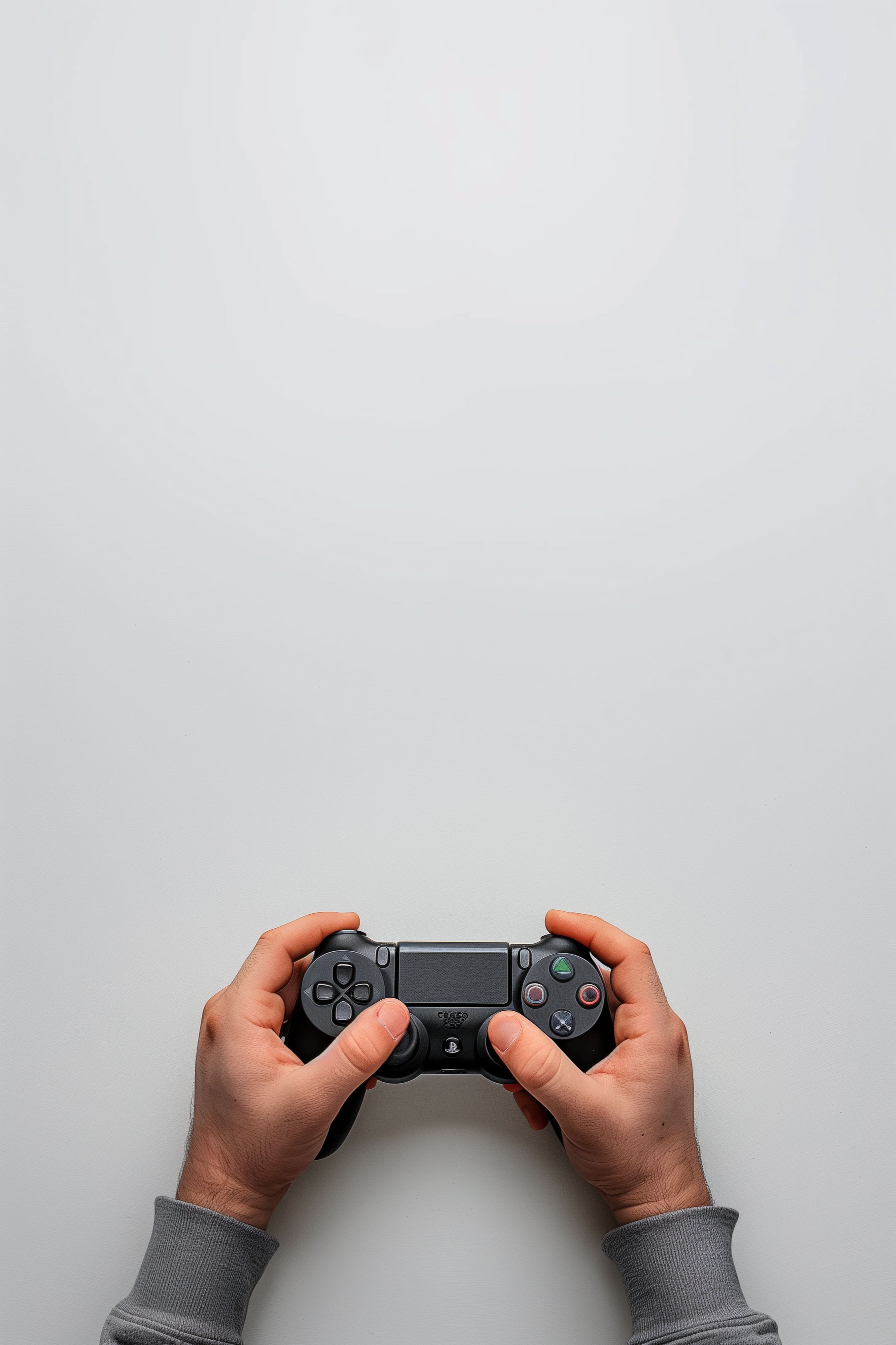 Hands Holding Gaming Controller Photo on Lummi